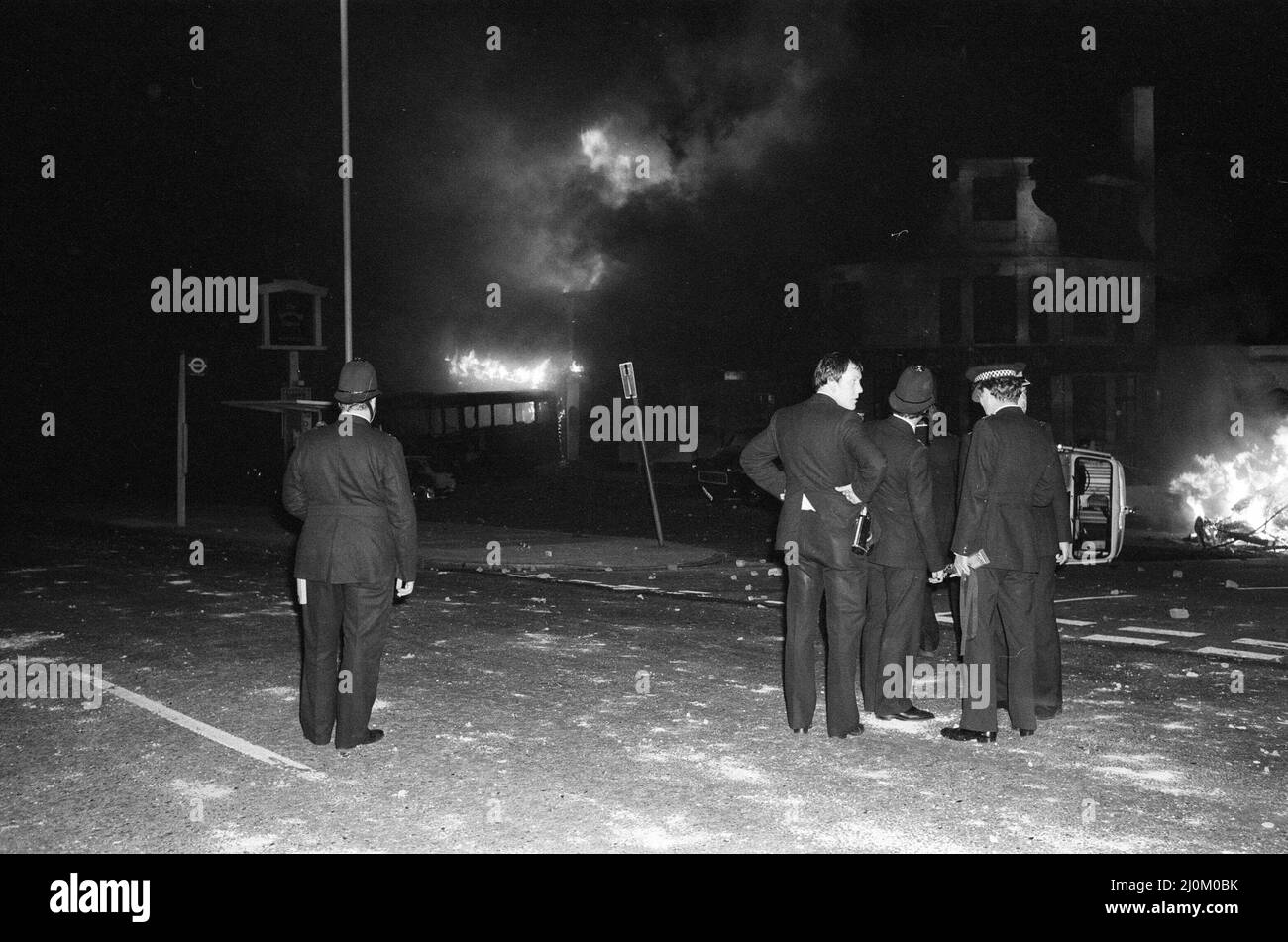 Southall Riots General scene pictures with people, policemen, fire, and ...