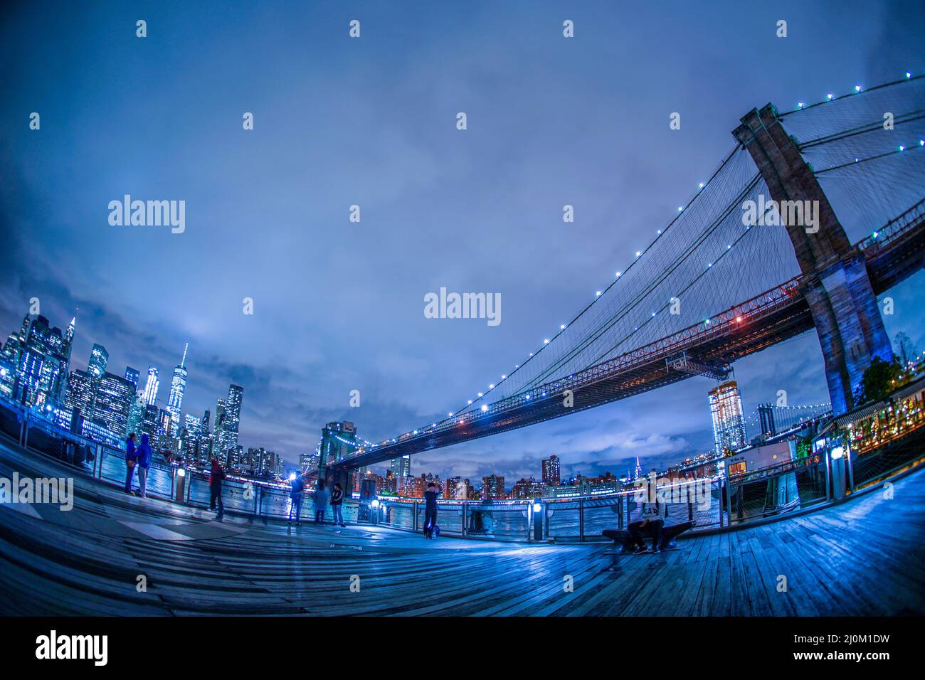 Manhattan and Brooklyn bridge night view and the people Stock Photo - Alamy