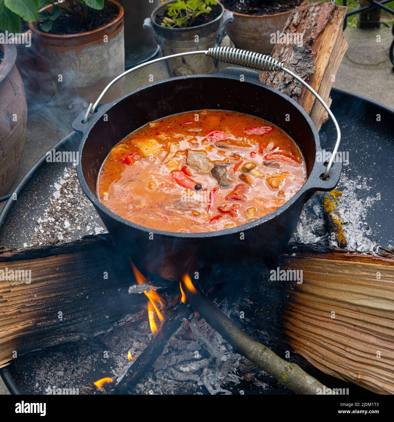 Kettle goulash is prepared over an open fire! Stock Photo - Alamy