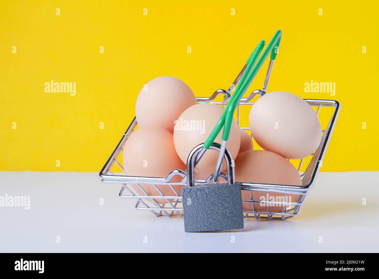Ban on the sale of chicken eggs. Food sanctions. Basket with groceries ...