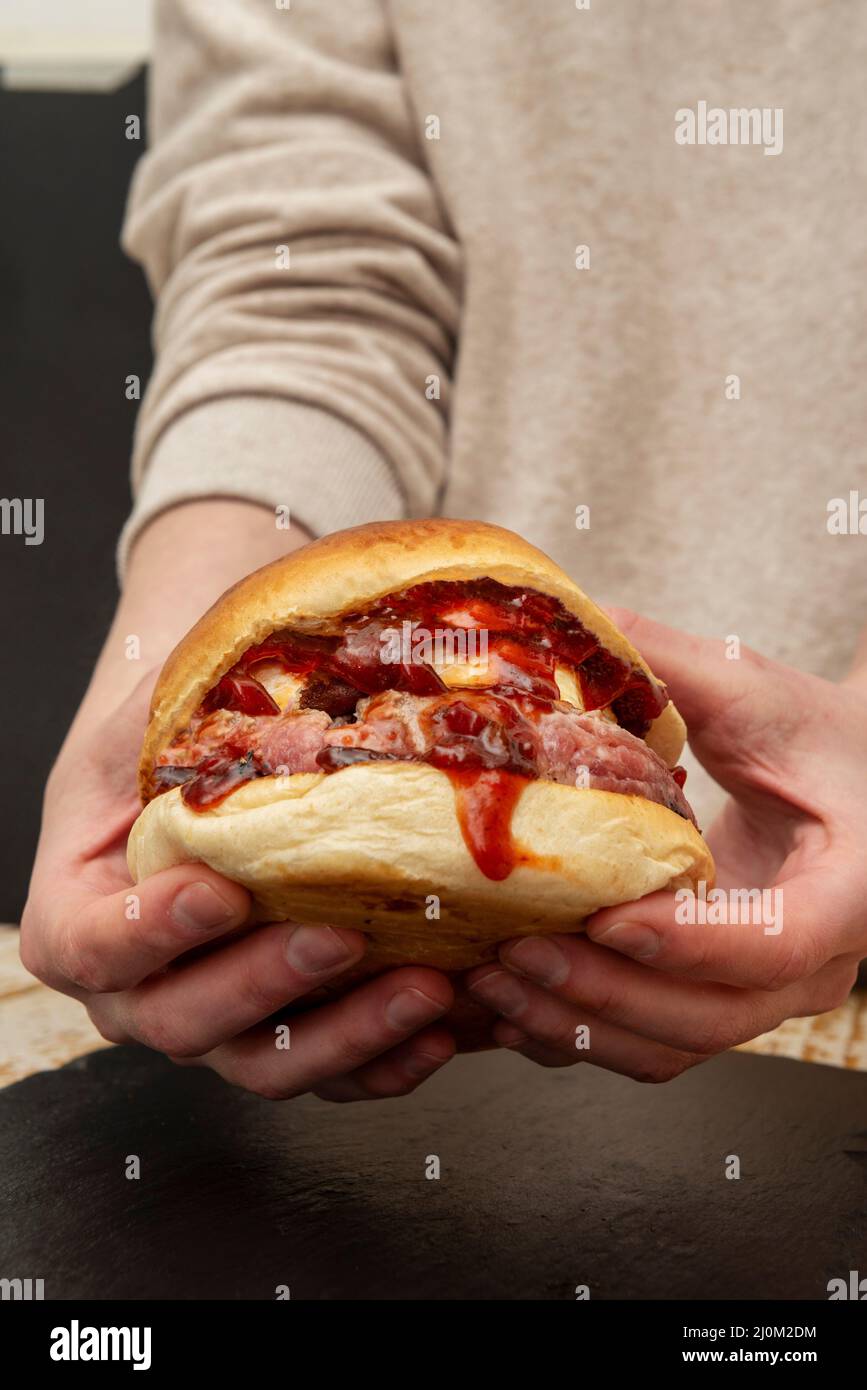 Delicious beef burger with goat cheese and lots of spicy tomato jam ...