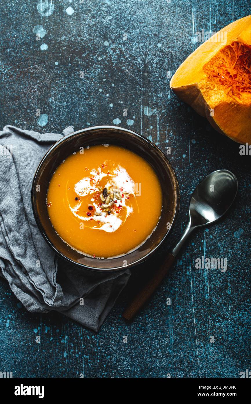 Pumpkin cream soup top view Stock Photo - Alamy