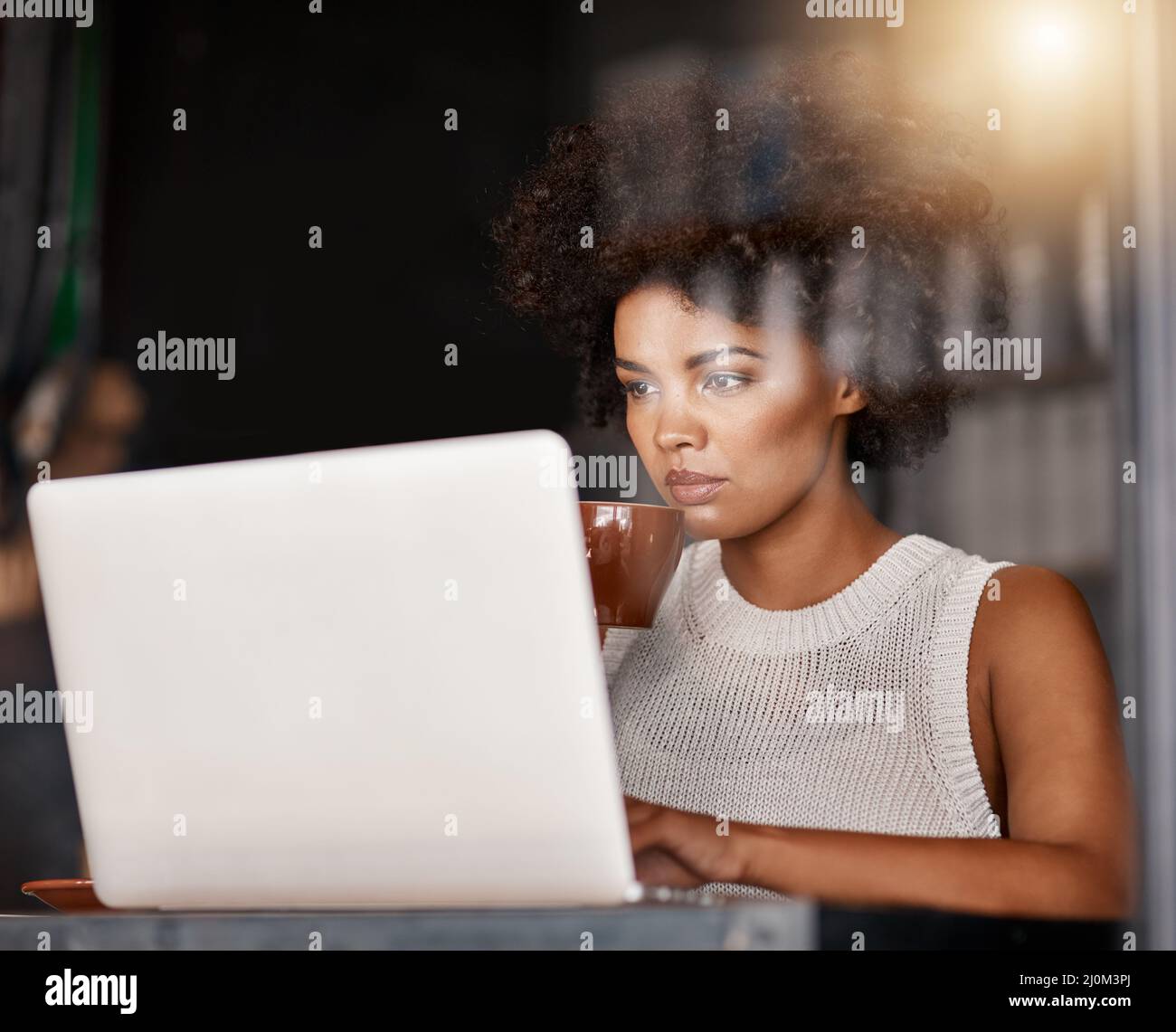Young women ordering online laptop hi-res stock photography and images ...