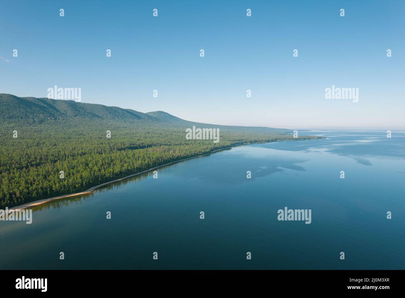 Fantastic panorama of Lake Baikal at sunset is a rift lake located in ...