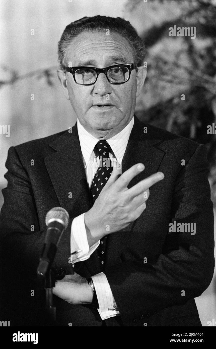 Henry Kissinger speaking at a press conference, answering questions ...