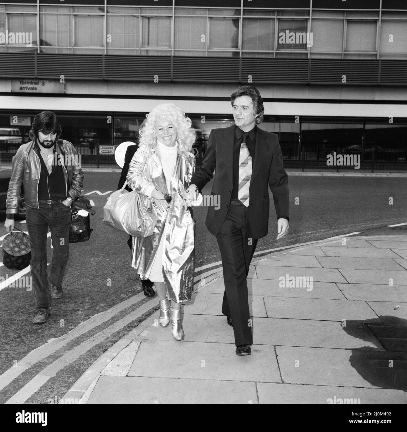 Barbara Windsor and her husband Ronnie Knight arriving at Heathrow ...