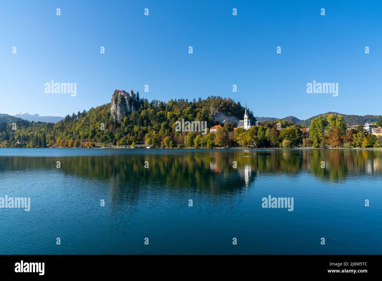A view of Lake Bled with the Bled Castle and village in autumn Stock ...