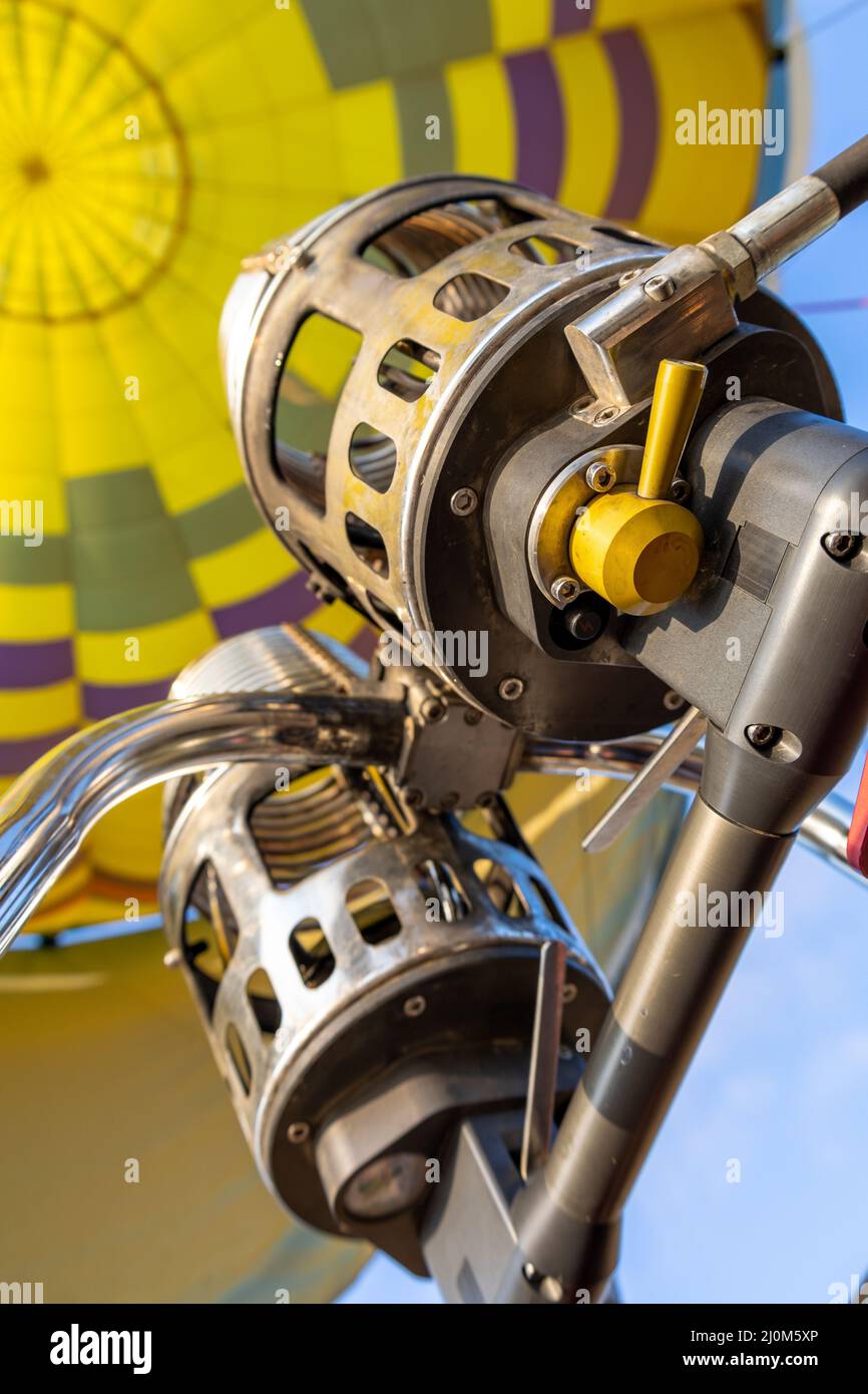 Burner system of a colorful hot air balloon Stock Photo - Alamy