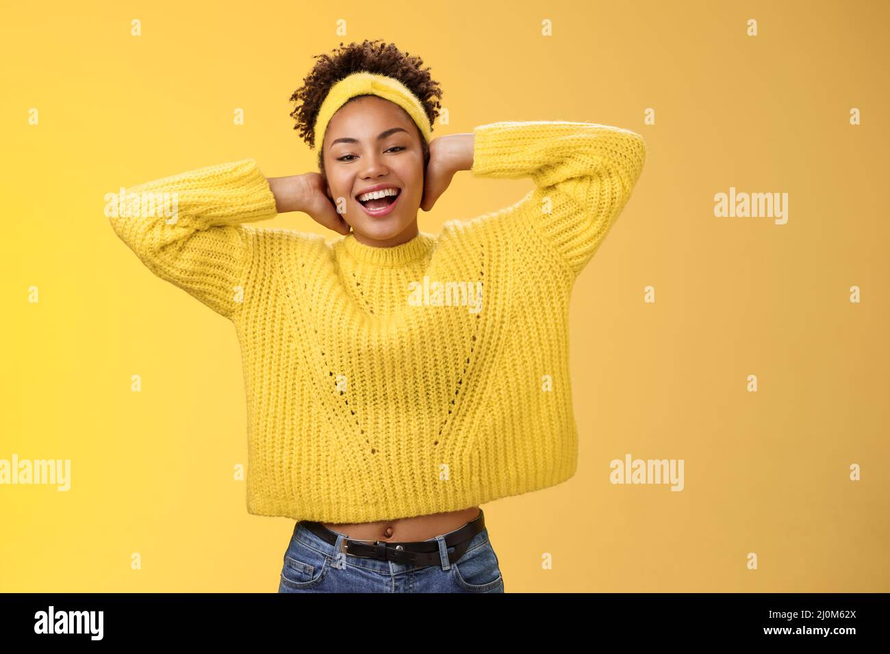 Carefree outgoing young charming african-american girl lay back hands ...