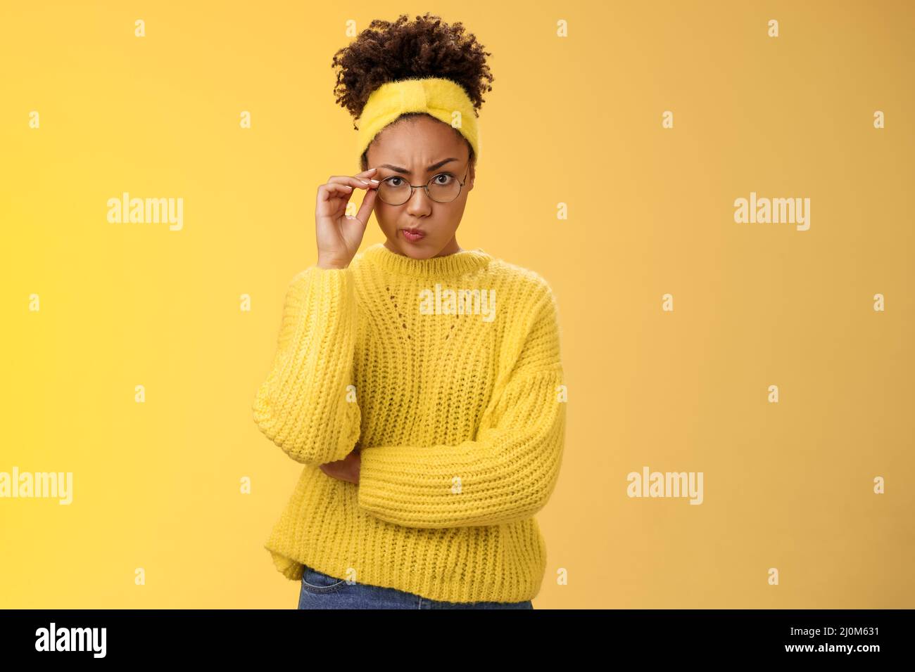 Suspicious strict serious-looking attractive clever african-american ...