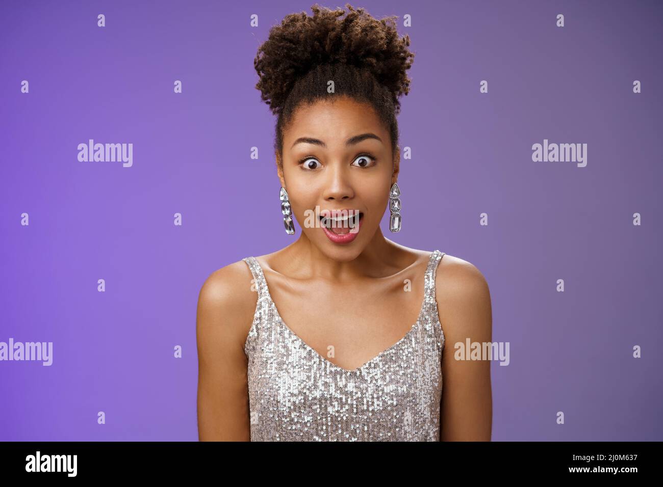 Close-up african-american impressed speechless young girl open mouth ...