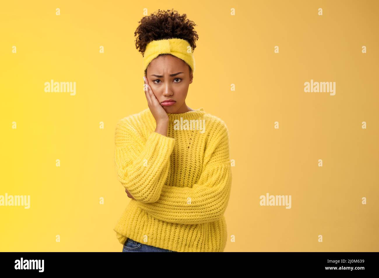 Upset cute gloomy young timid girl offended feel sadness regret touch ...