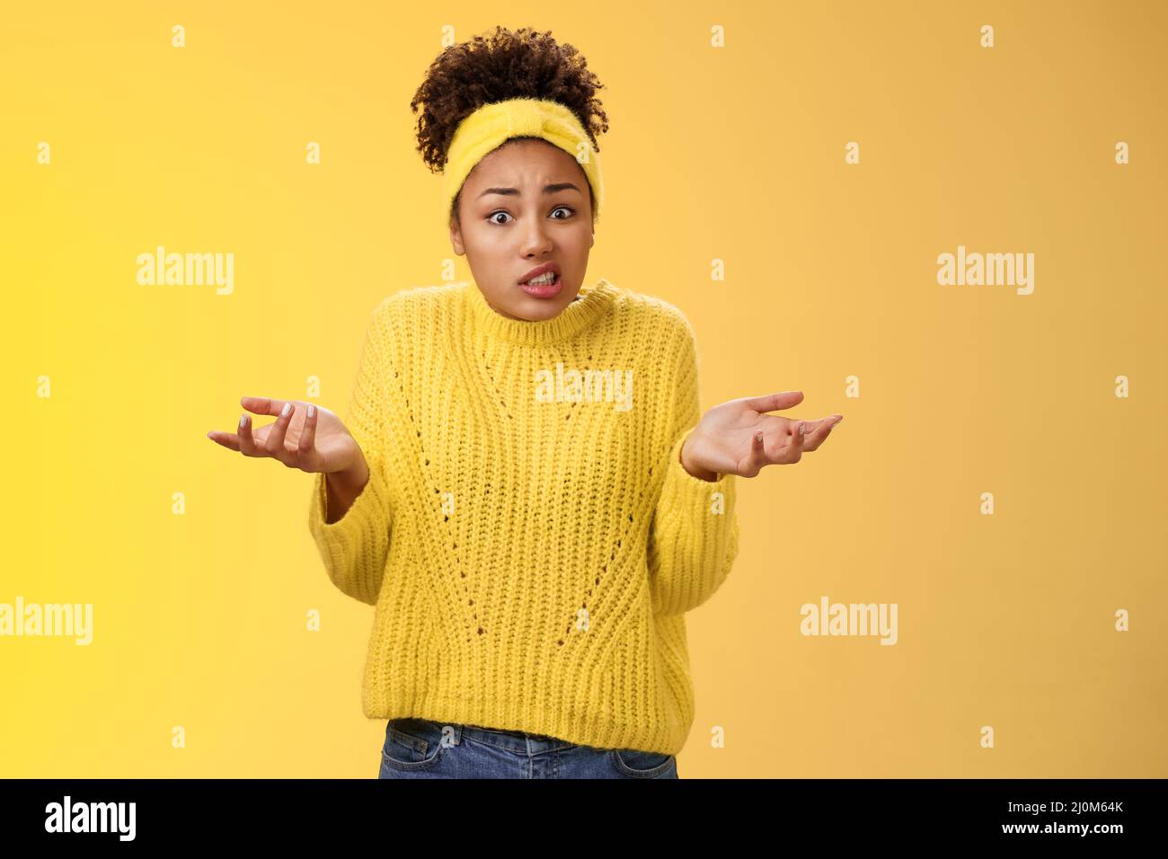 Confused awkward cute female employee messed-up papers lost paperwork ...