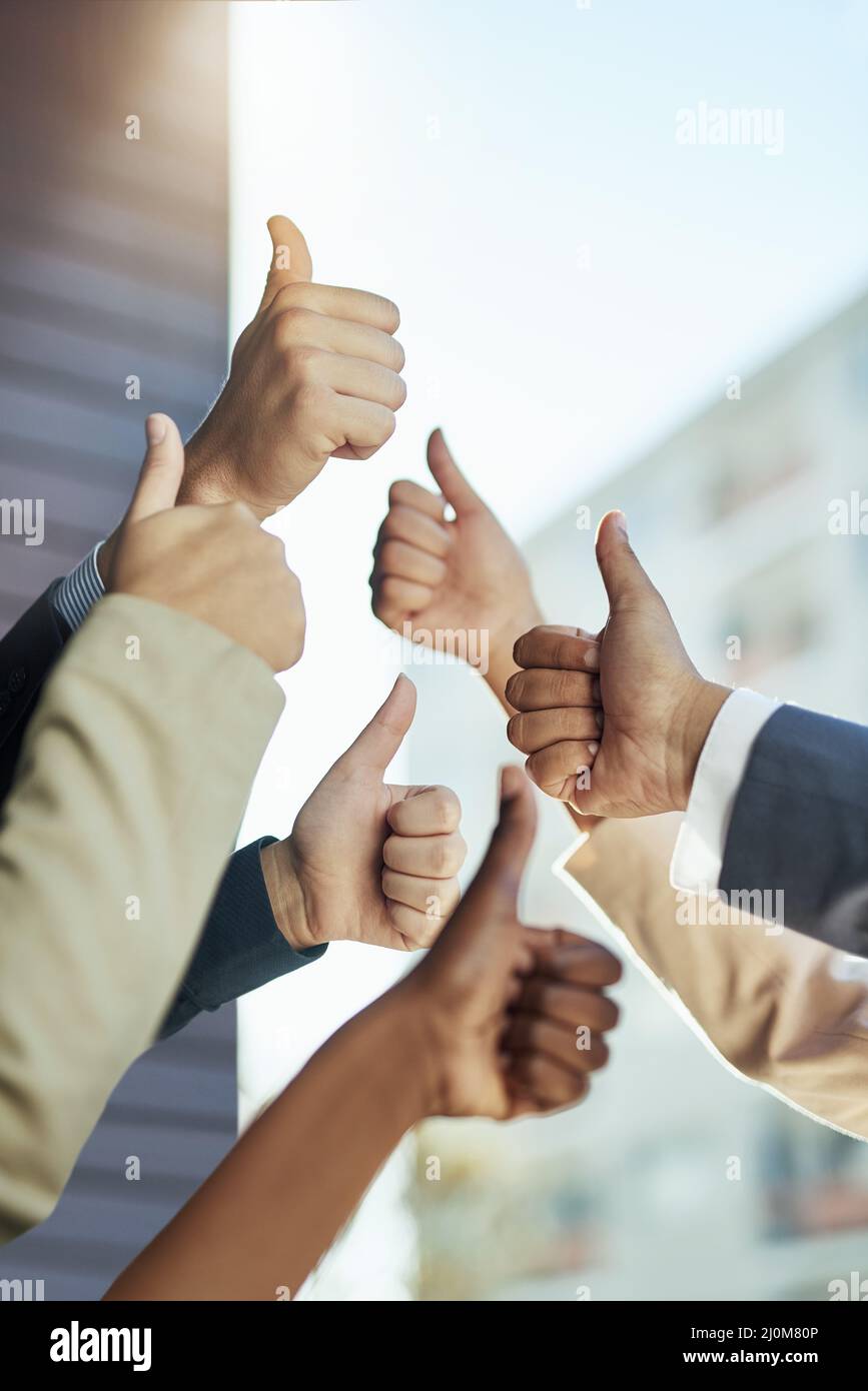 Its a thumbs up from us. Shot of a group of hands showing thumbs up ...