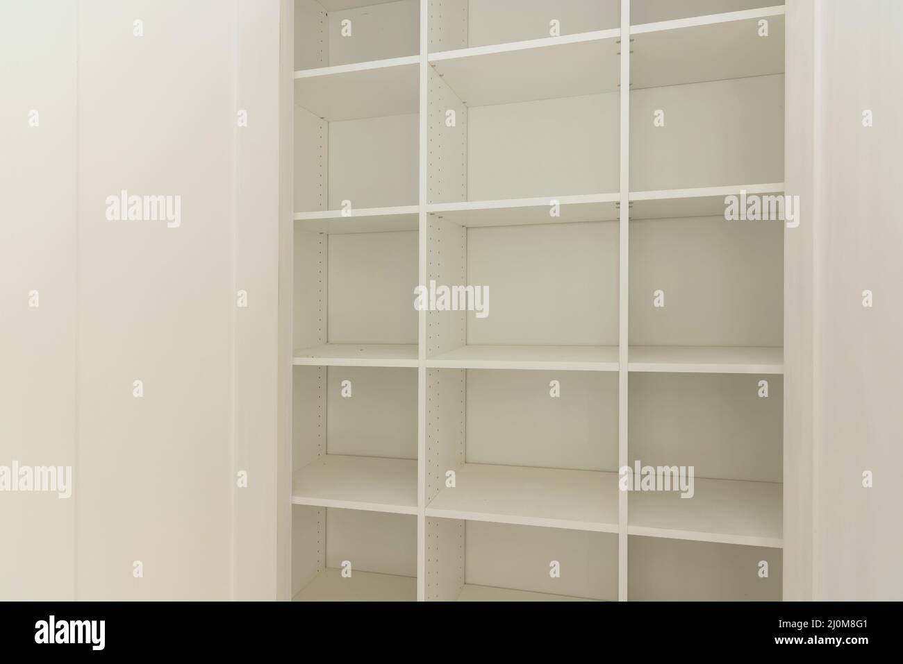 Installation new home interior of white shelf or clothing with many ...