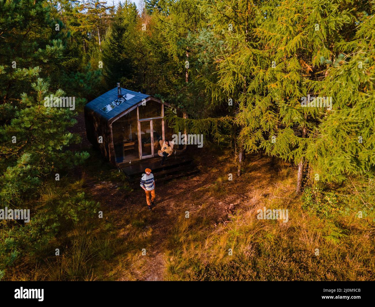 Wooden hut in autumn forest in the Netherlands, cabin off grid ,wooden ...