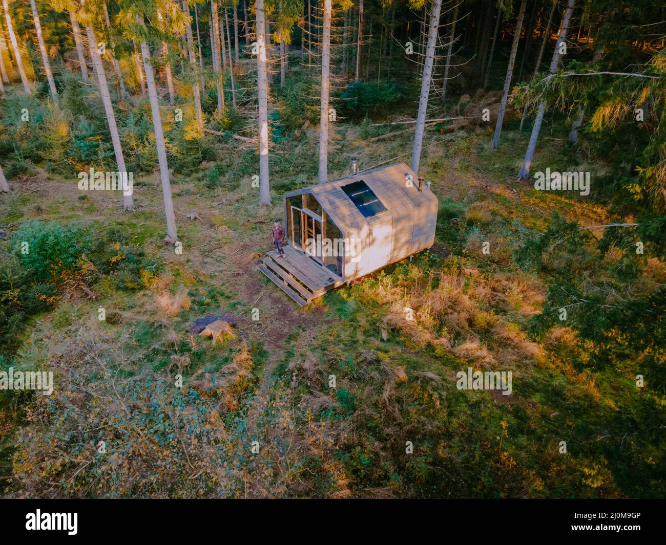 Wooden hut in autumn forest in the Netherlands, cabin off grid ,wooden ...