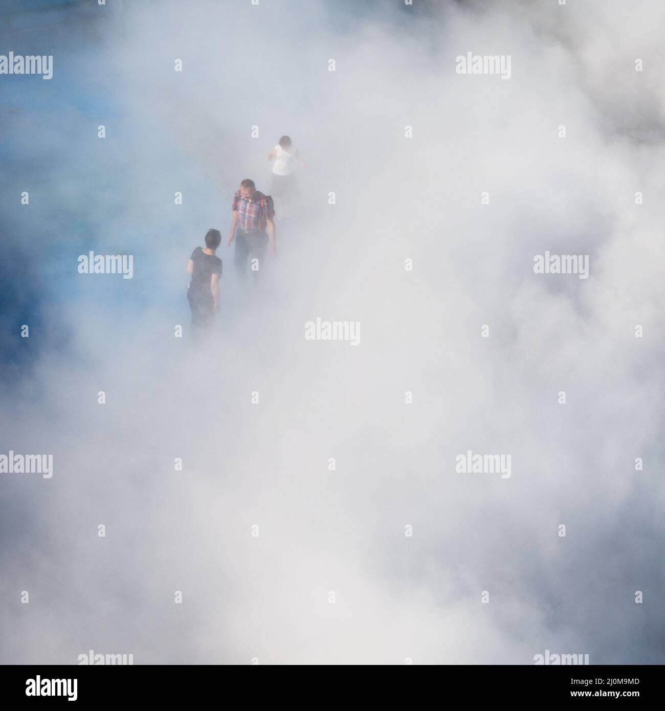 People in fog Stock Photo - Alamy