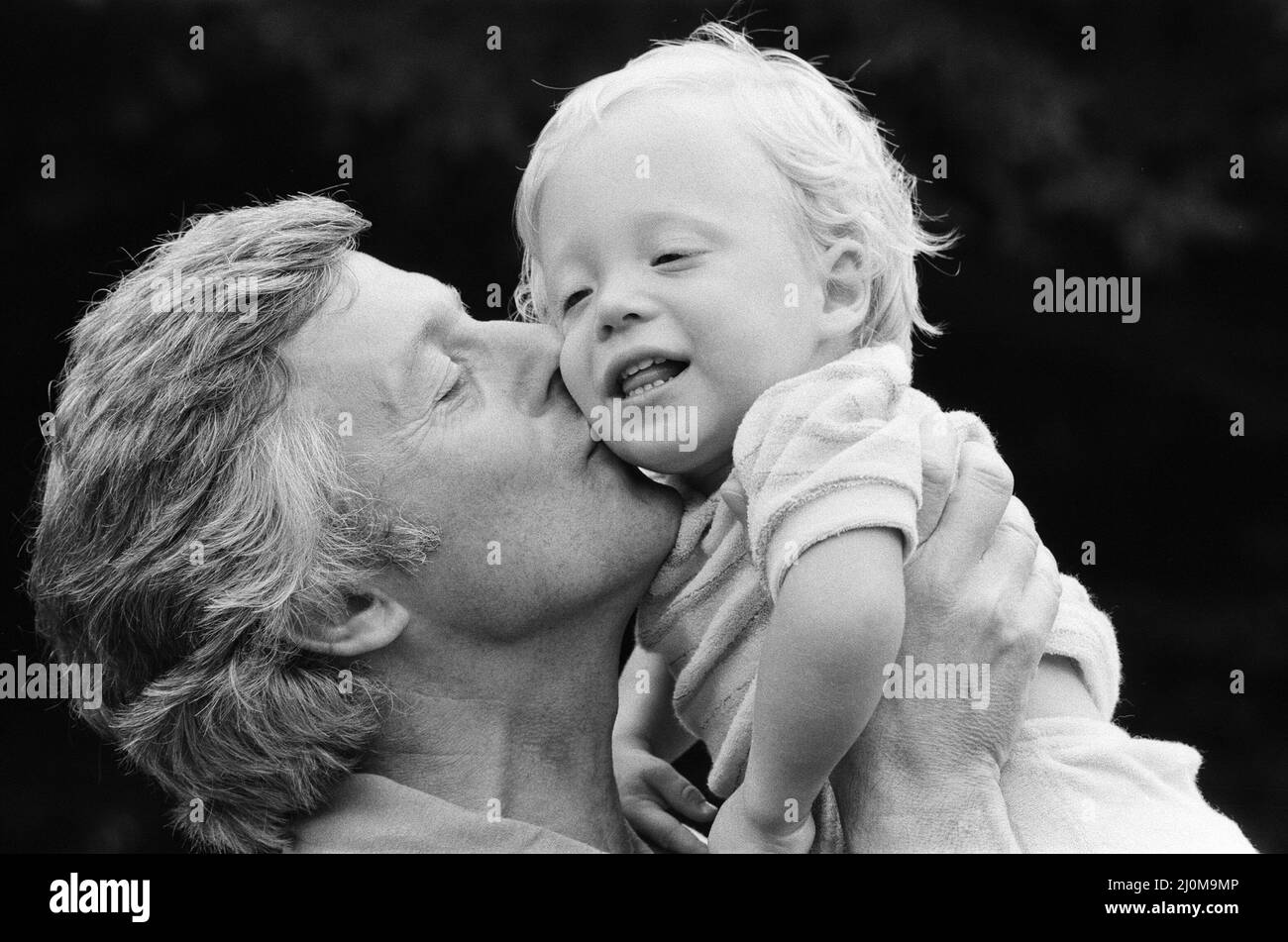 Michael Aspel pictured at home with his family. September 1982 Stock ...