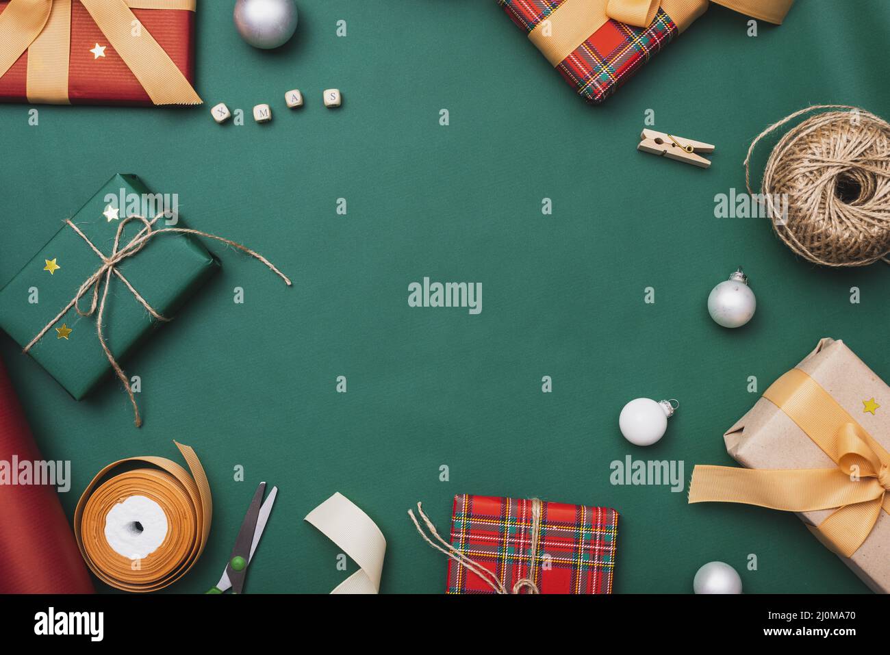 Gift boxes with string ribbon christmas Stock Photo - Alamy