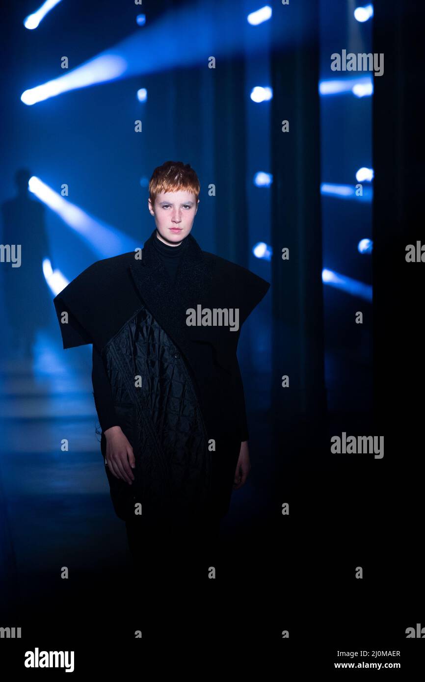 A model walks the runway with the collection of the brand April&Alex ...