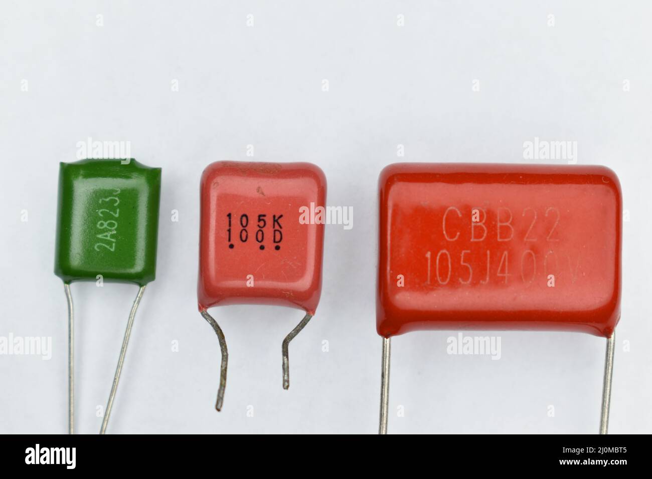 mylar capacitors on white background Stock Photo - Alamy