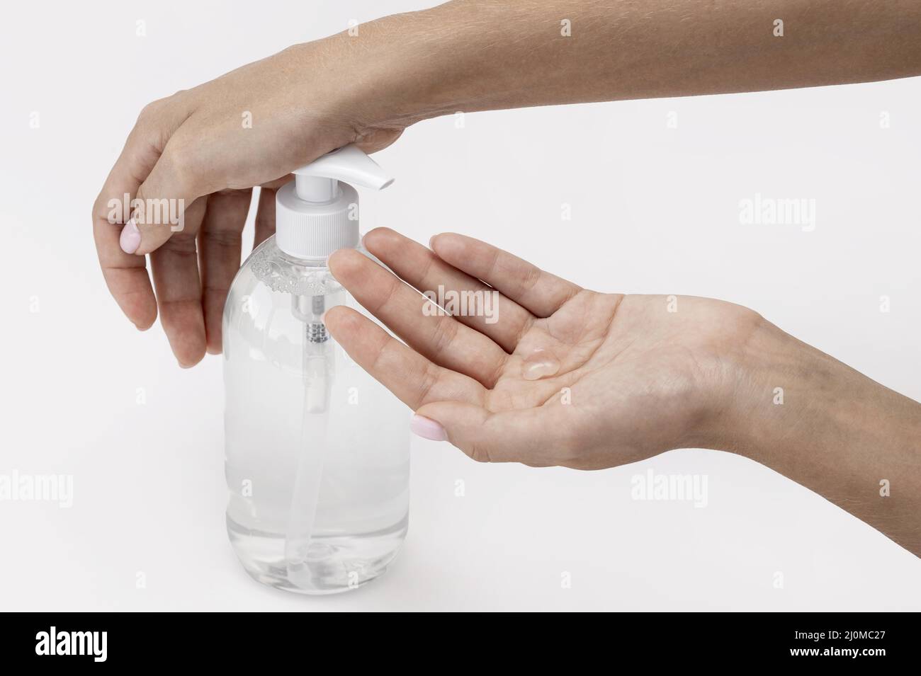 High angle person using liquid soap Stock Photo - Alamy