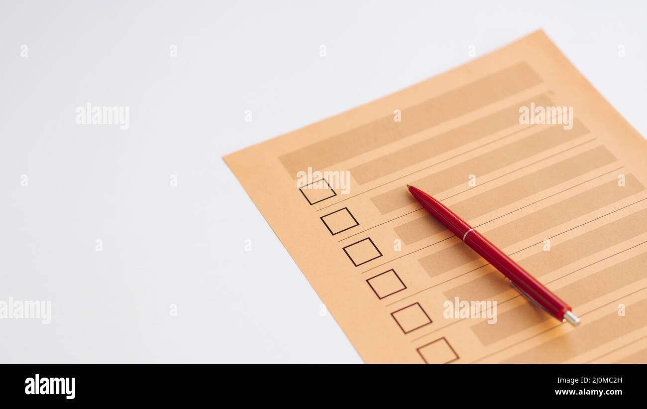 High angle uncompleted voting questionnaire Stock Photo - Alamy