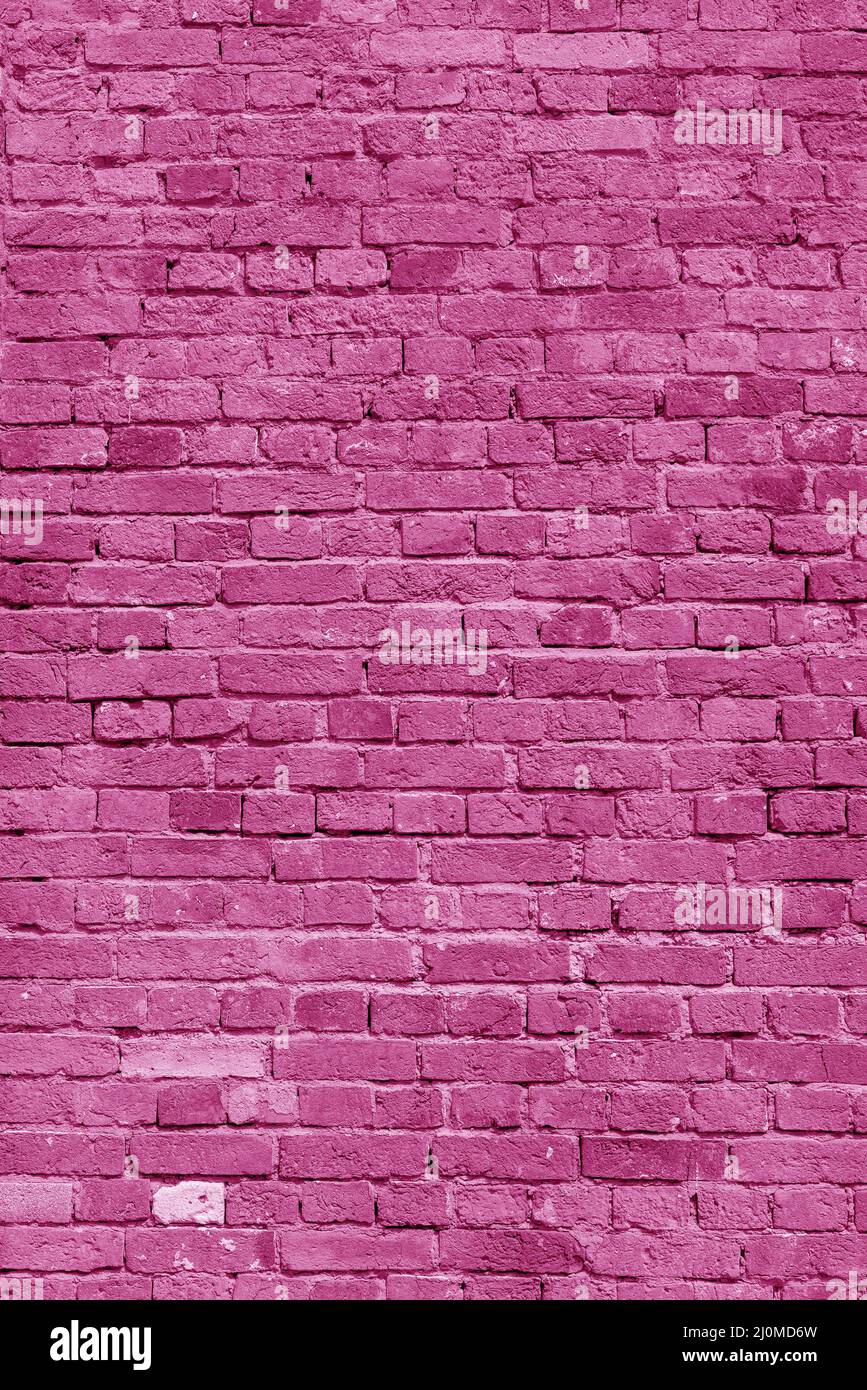 Pink brick wall. Loft interior design. Pink paint of the facade ...