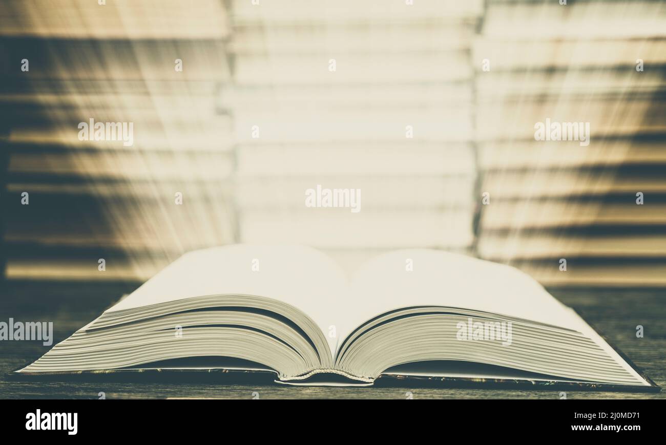 Book pages emit light. Symbol of wisdom, knowledge and learning Stock ...