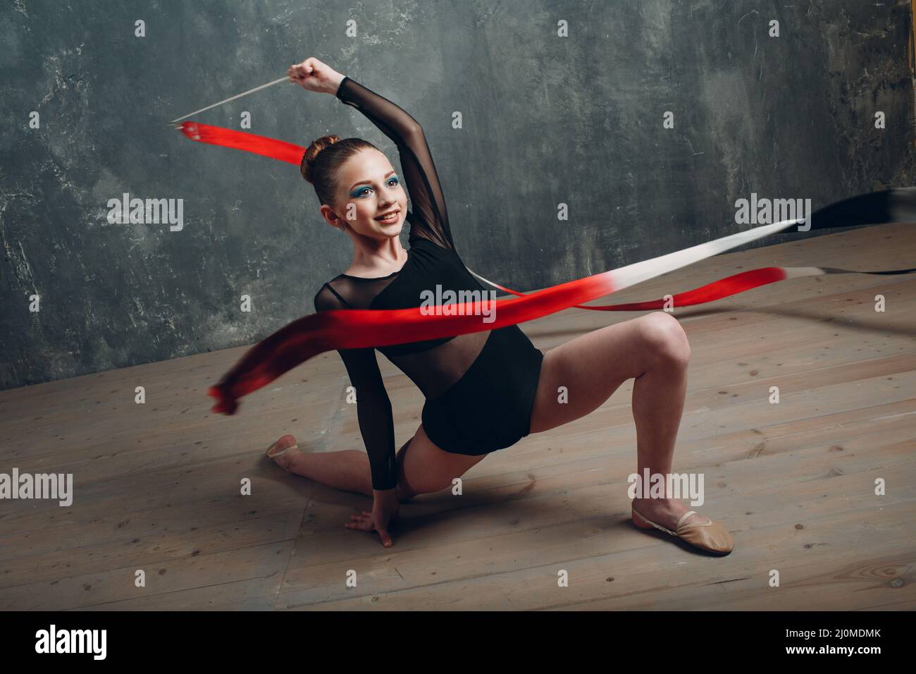 Beautiful flexible girl gymnast hi-res stock photography and images - Alamy