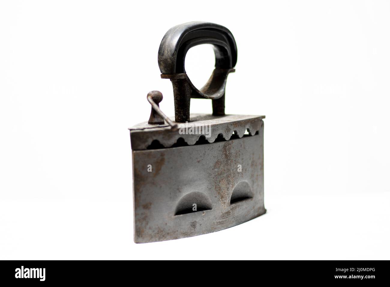 Unique antique coal iron isolated on white background. Close up. Detail ...