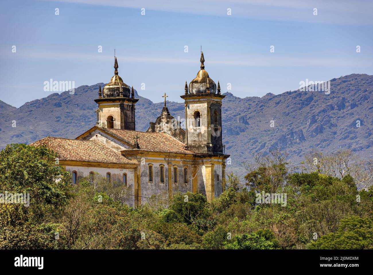View from behind an old colonial-style church Stock Photo - Alamy