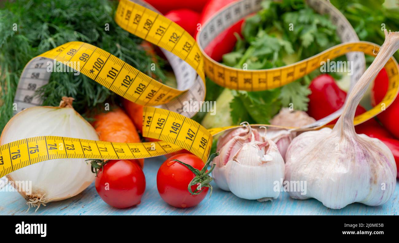 Measuring tape for measuring the circumference. Vegetables for diet ...