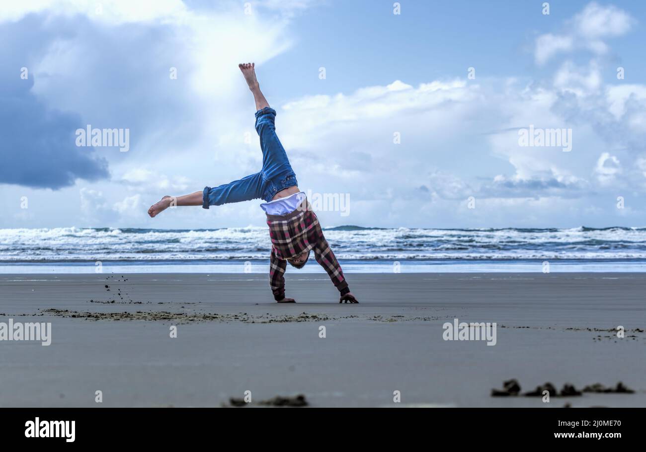Cartwheel on the beach hi-res stock photography and images - Alamy