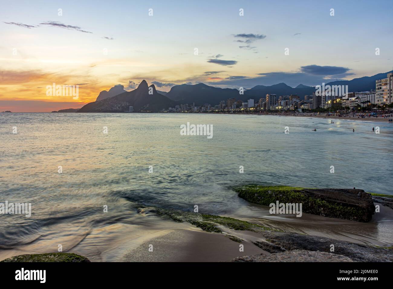 Beautiful sunset behind the mountains and sea Stock Photo - Alamy