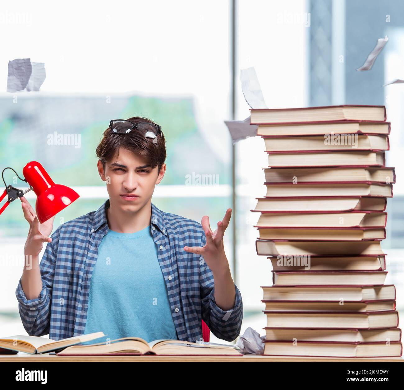 Young student under stress before exams Stock Photo - Alamy