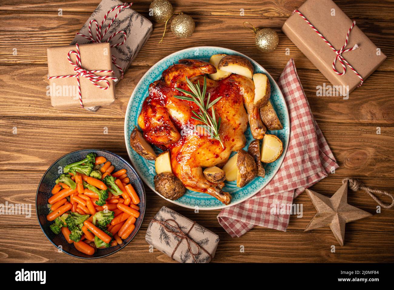 Christmas meal with roasted chicken top view Stock Photo - Alamy