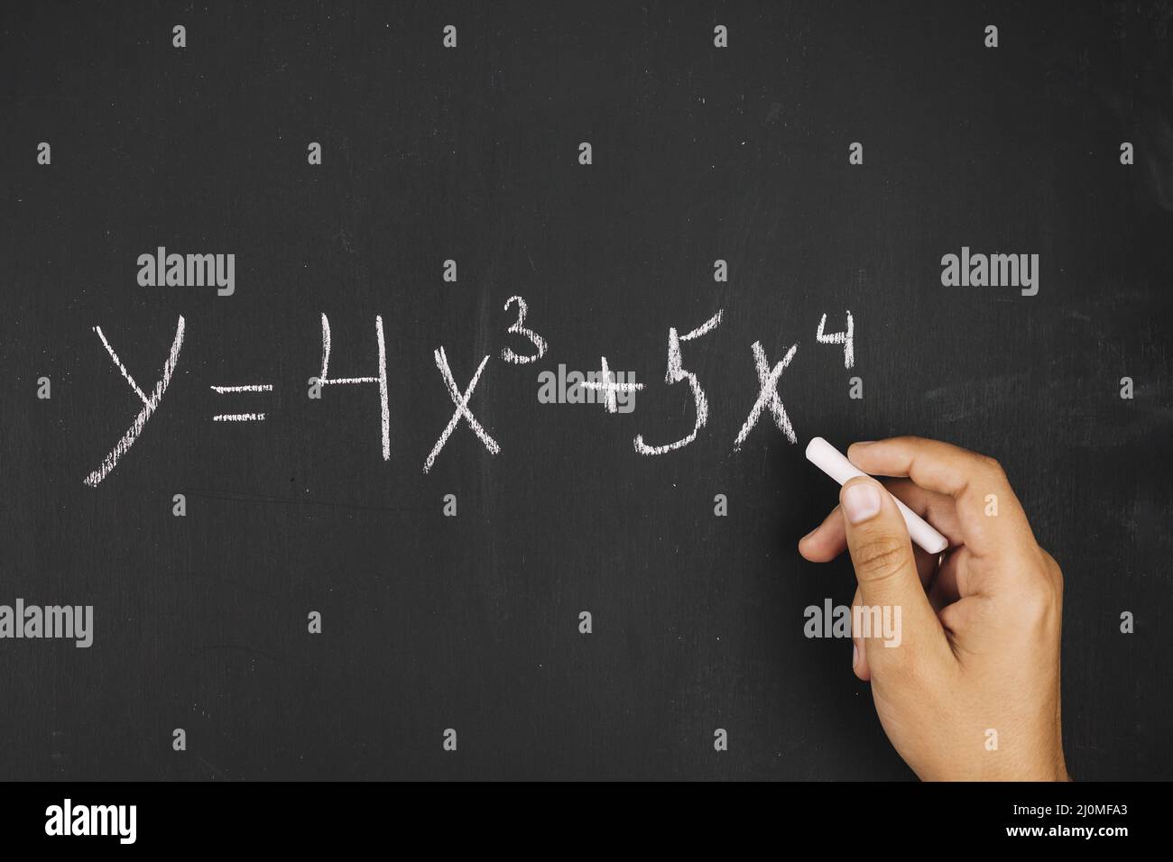 Hand writing math equation Stock Photo - Alamy