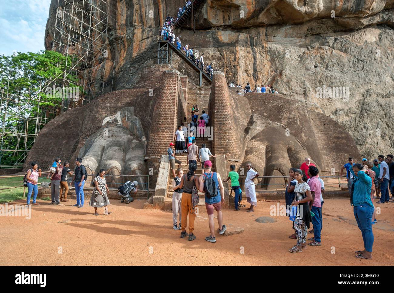 Tourists stand adjacent to the Lions Paws on the Lion Platform at ...