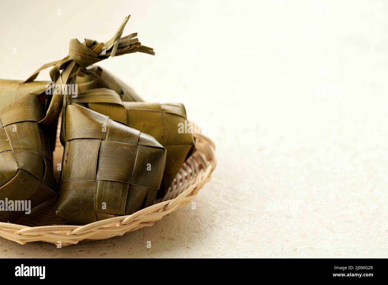 Ketupat, Diamond Shaped Rice Dumpling for Eid Mubarak, with Copy Space ...