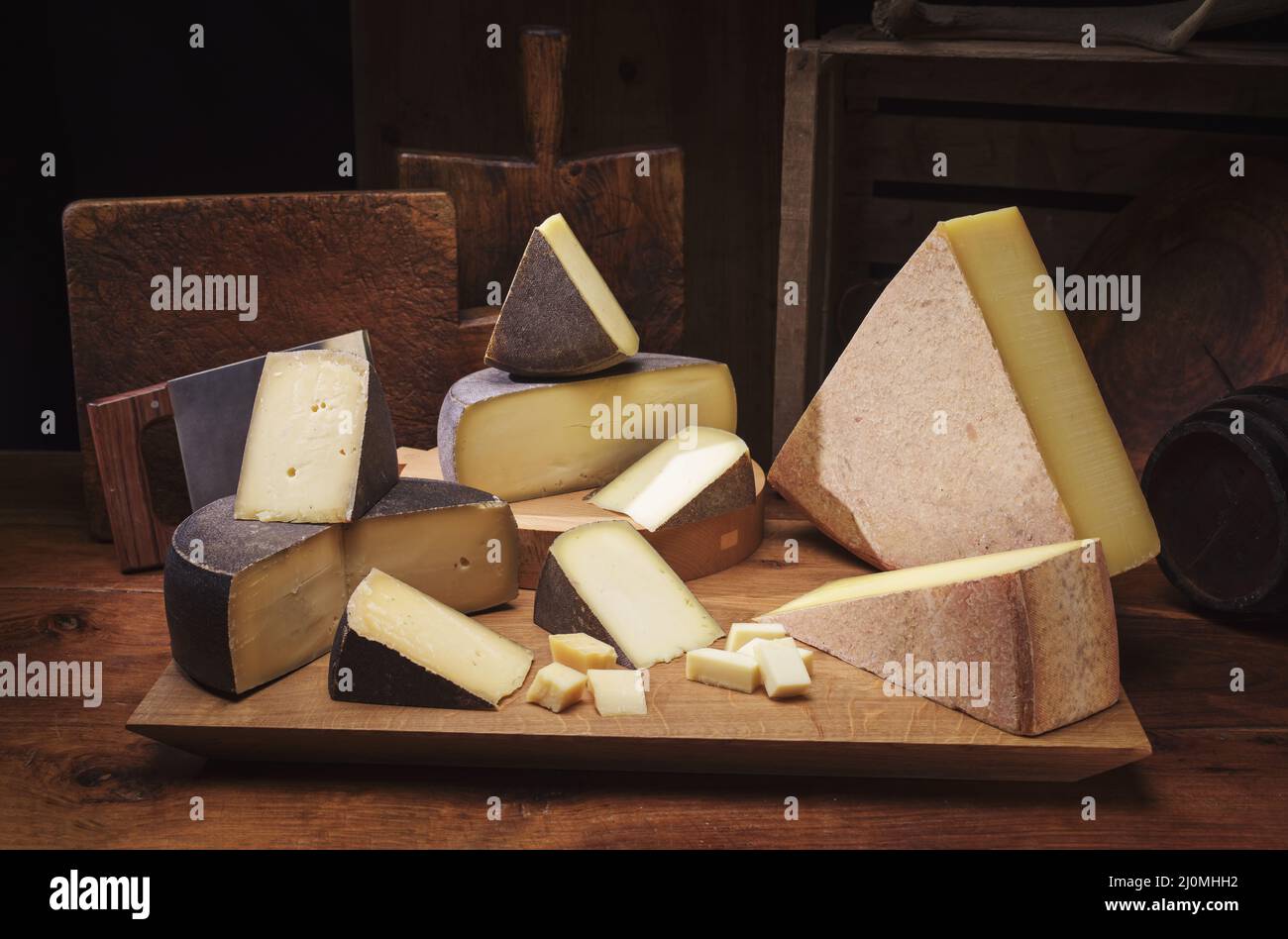 Traditional aged mountain cheese of the Alps offered as loaf and piece ...