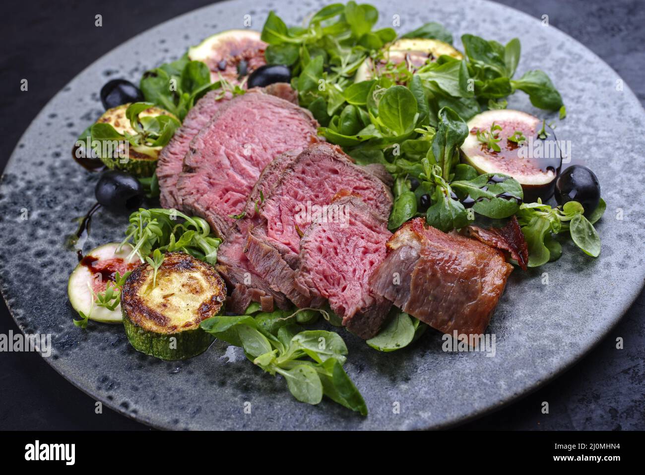 Modern style traditional fried dry aged angus beef filet medaillons ...