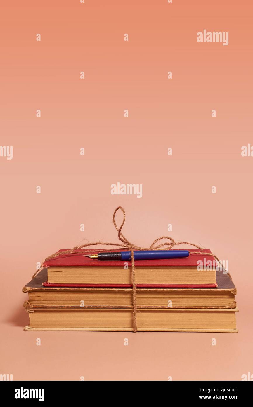 Books tied with rope hi-res stock photography and images - Alamy