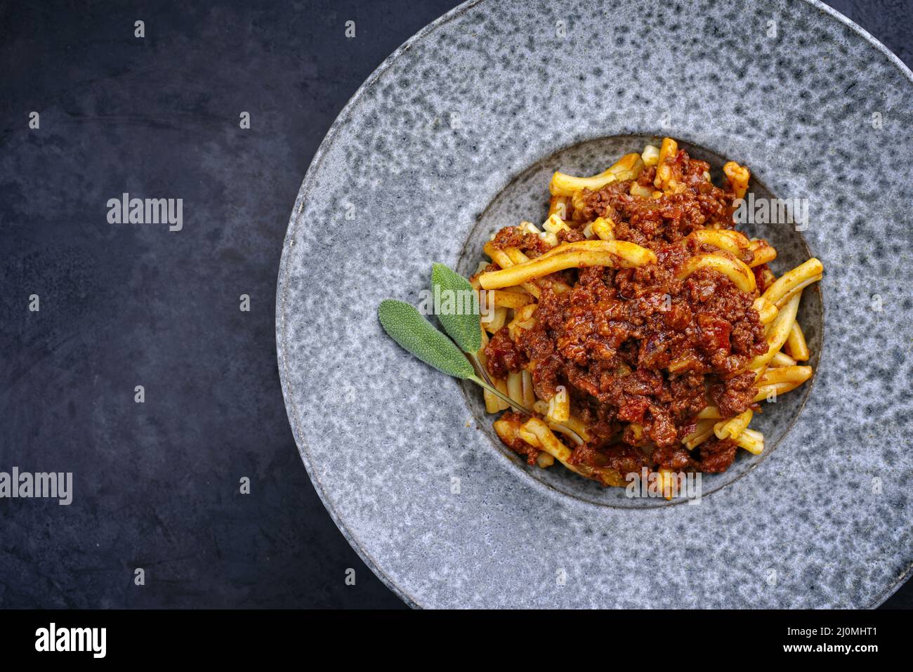 Modern style traditional casarecce al bronzo al rag italian pasta with ...