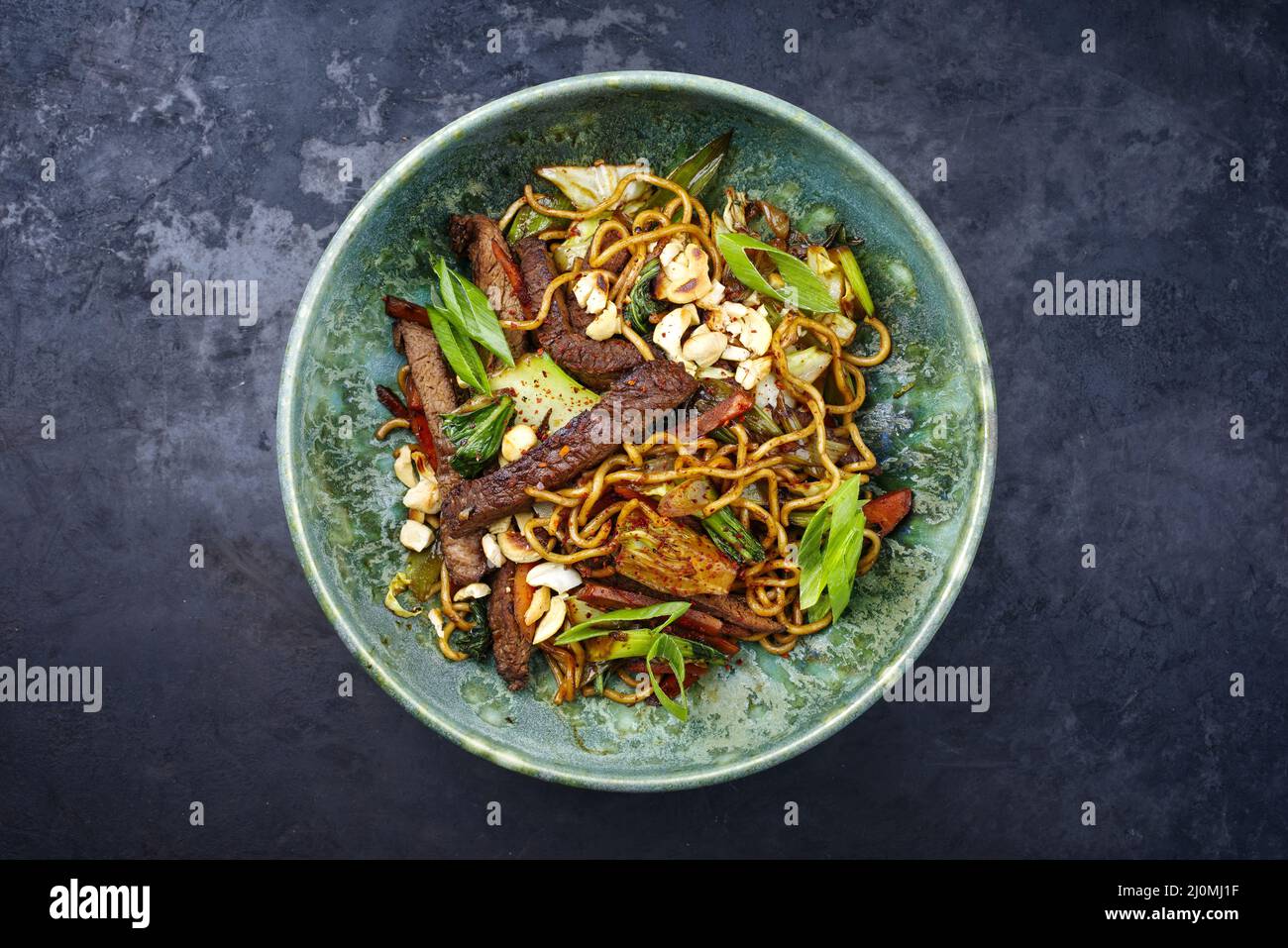 Modern style pad Thai beef with angus roast beef slices Stock Photo - Alamy