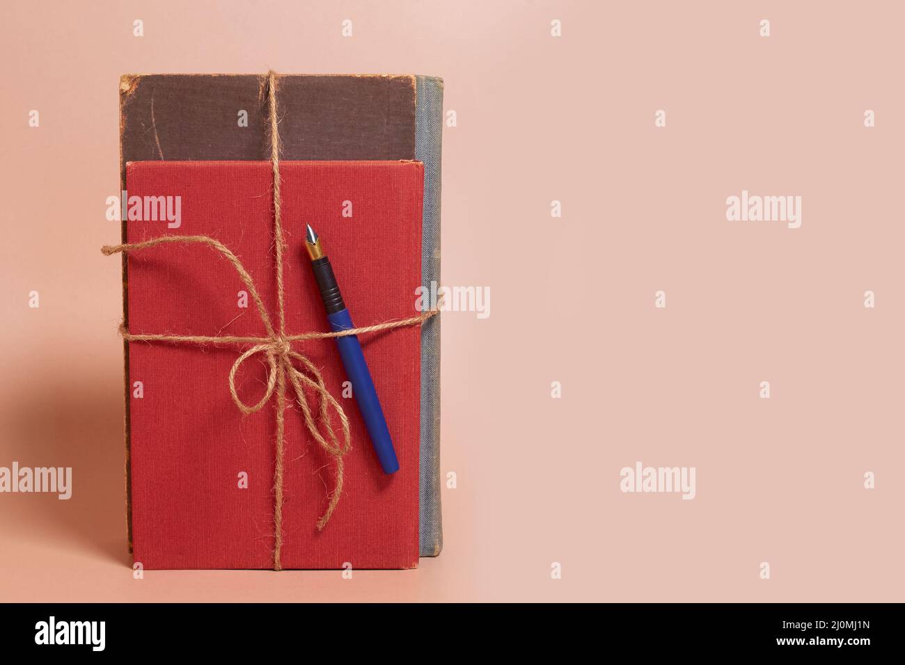 Books tied with a rope hi-res stock photography and images - Alamy