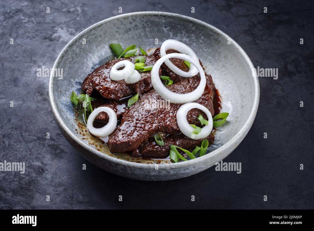 Modern style traditional Cuban dry aged angus bistec encebollado steak ...