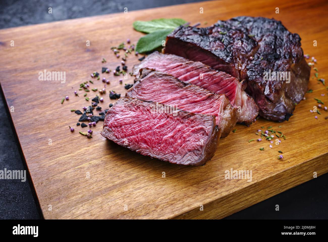 Barbecue dry aged wagyu rib-eye beef steaks with herb and black salt ...