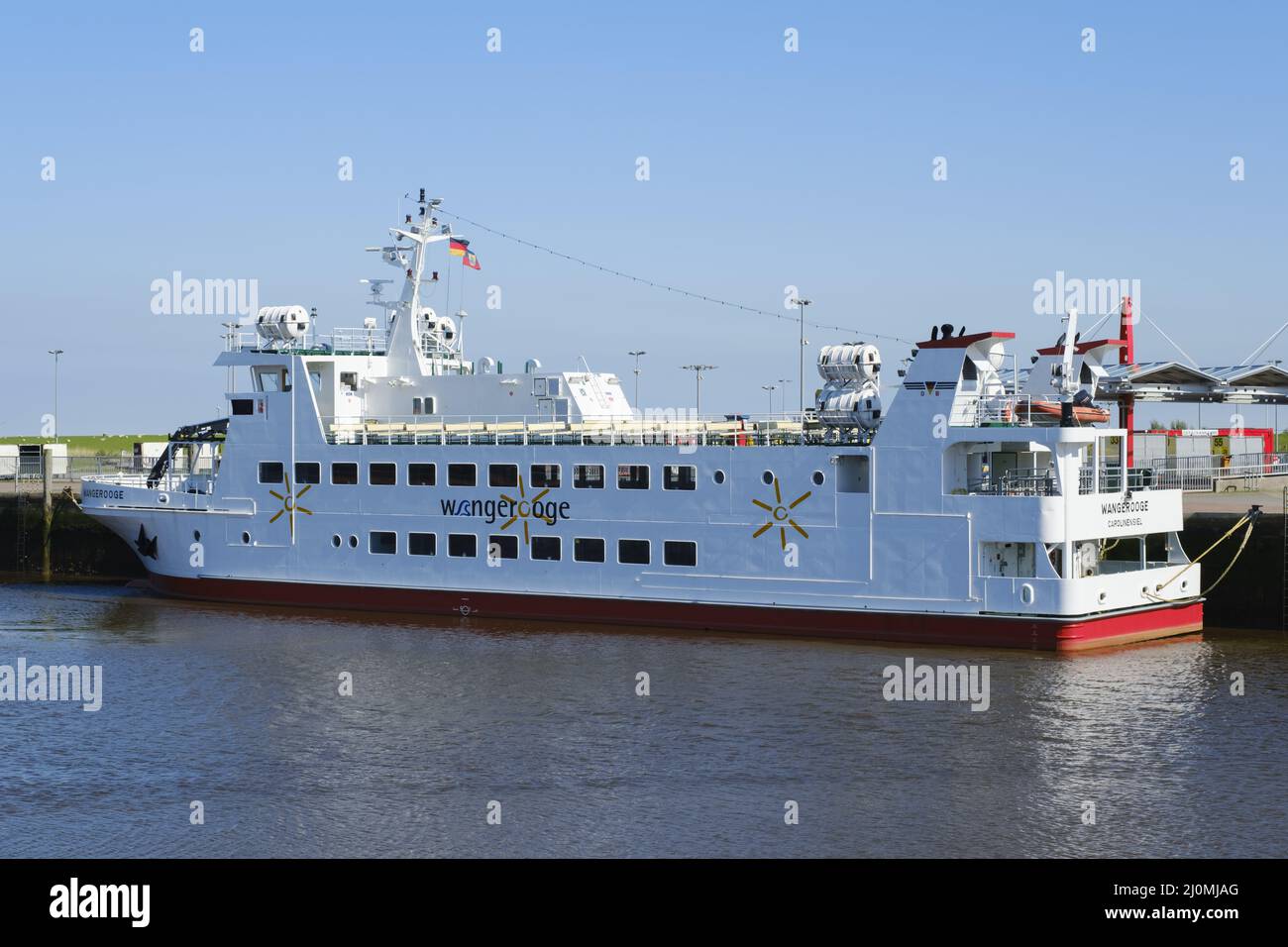 Ferry Wangerooge at the harbor of Harlesiel Stock Photo - Alamy